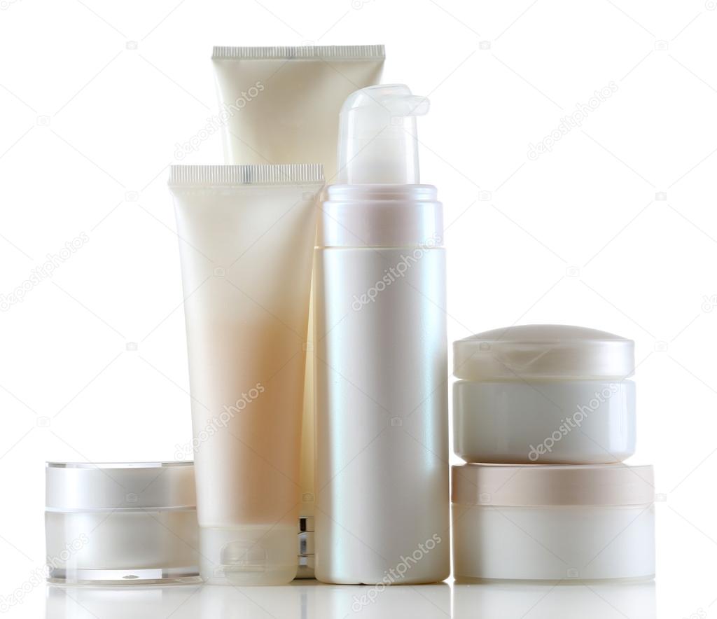 Group of cosmetic bottles isolated on white — Stock Photo © belchonock ...