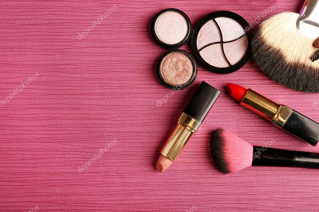 Set of colorful cosmetics on pink wooden table background — Stock Photo ...