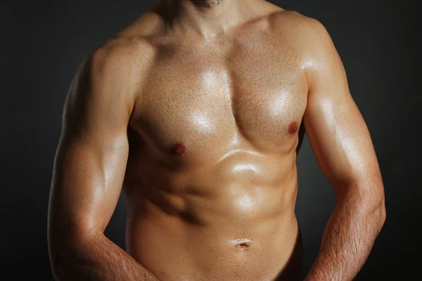 Muscle young man — Stock Photo © belchonock #70814055