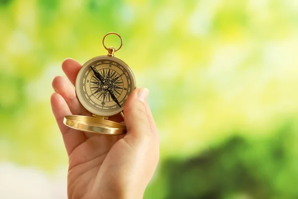 Female hand with compass - Stock Image - Everypixel