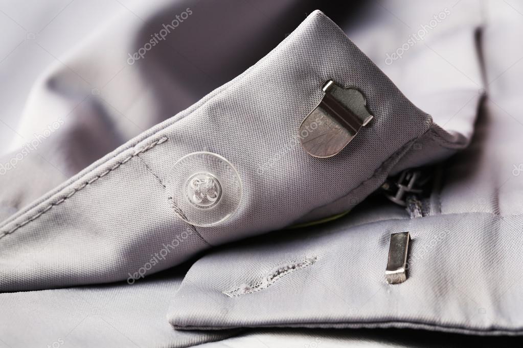 Button with metal clasp on clothes close up Stock Photo by ©belchonock ...