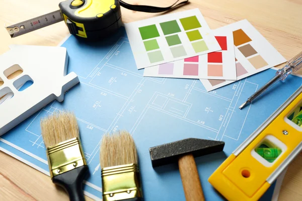 Construction instruments, plan and brushes Stock Photo by ©belchonock ...