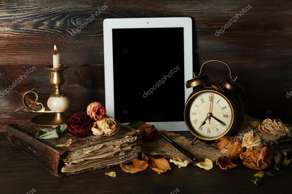Ancient things and tablet on wooden background Stock Photo by ...