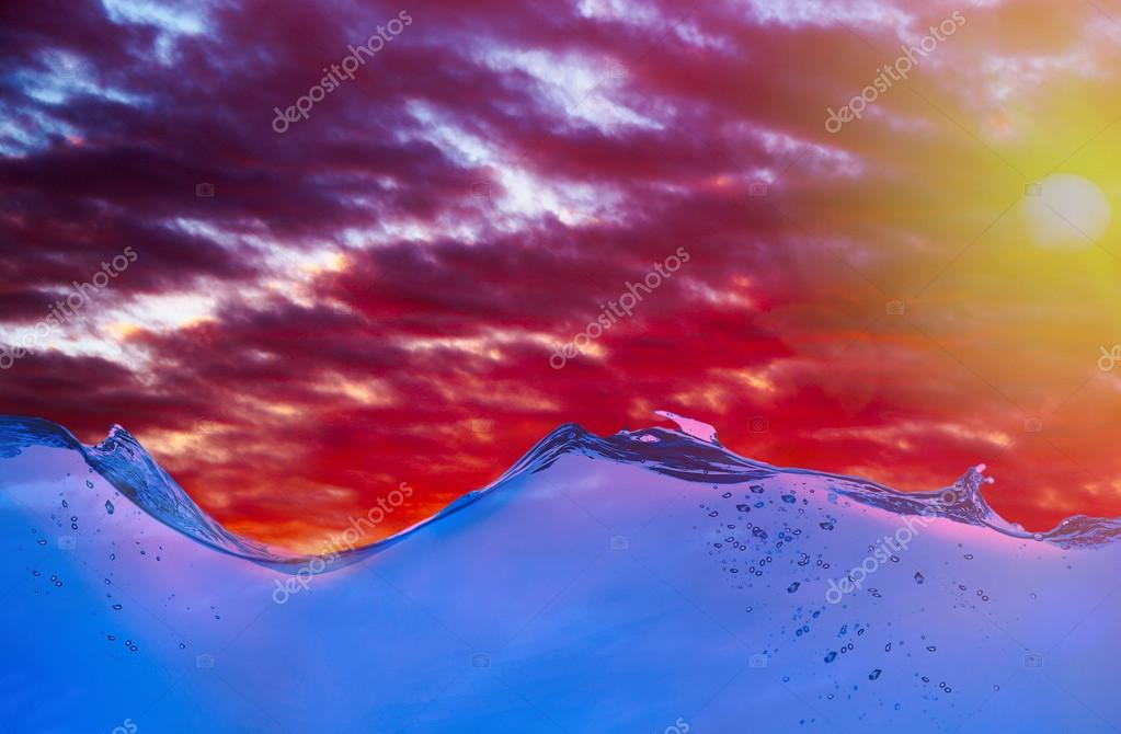 Water waves on sky background Stock Photo by ©belchonock 78066602