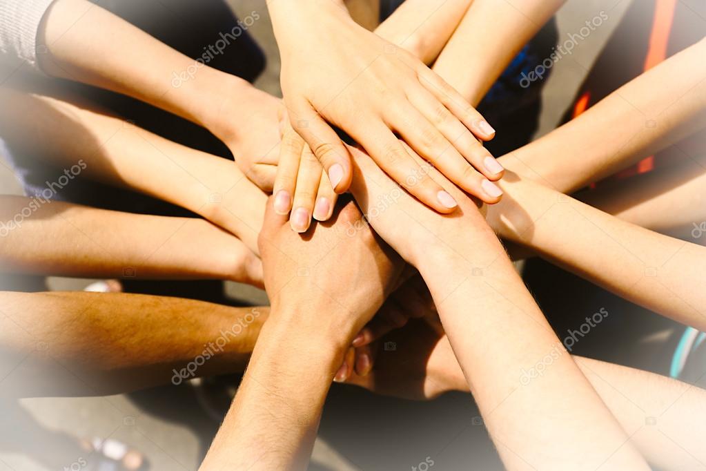 United hands close-up Stock Photo by ©belchonock 78155488