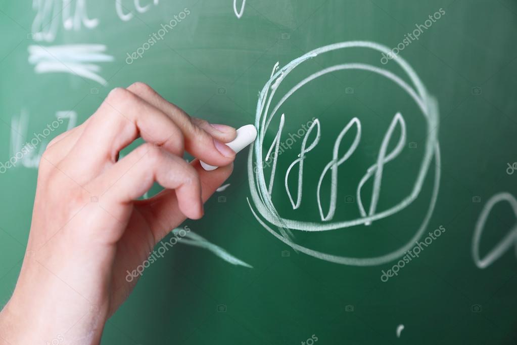 Female hand writing sentences on blackboard with chalk close up — Stock ...