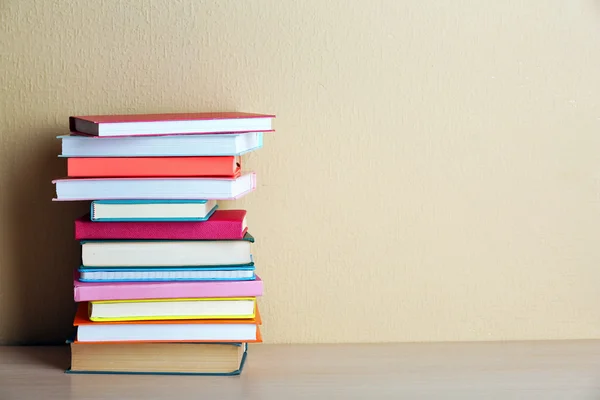 Stack of books on shelf. Stock Photo by ©belchonock 80207038