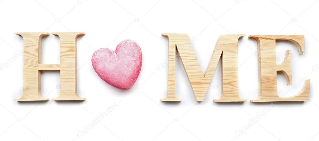 Decorative letters forming word HOME with heart isolated on white ...