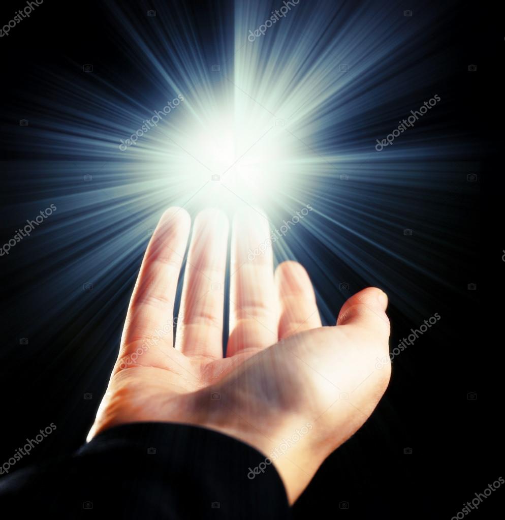 The light in young woman hand Stock Photo by ©belchonock 81422312