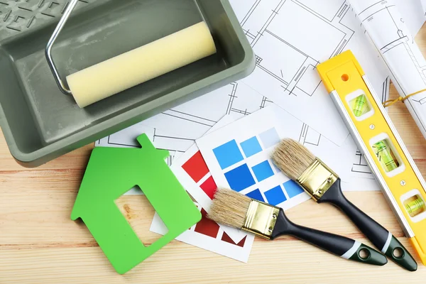 Construction instruments, plan and brushes Stock Photo by ©belchonock ...