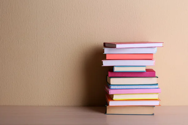 Stack of books on shelf. Stock Photo by ©belchonock 80207038