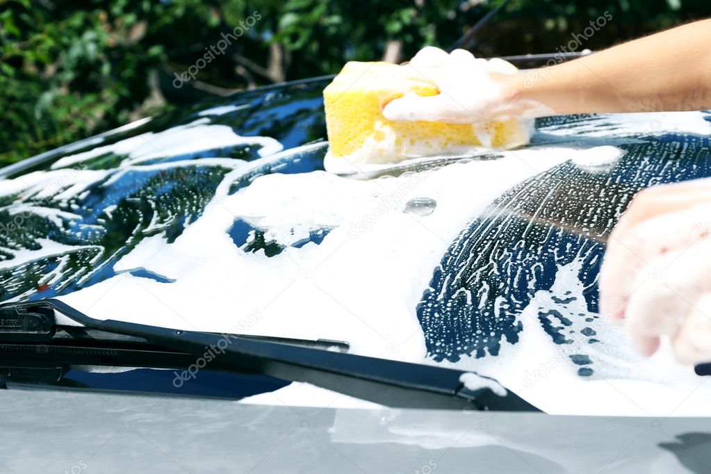 Hand washing car window Stock Photo by ©belchonock 82108714
