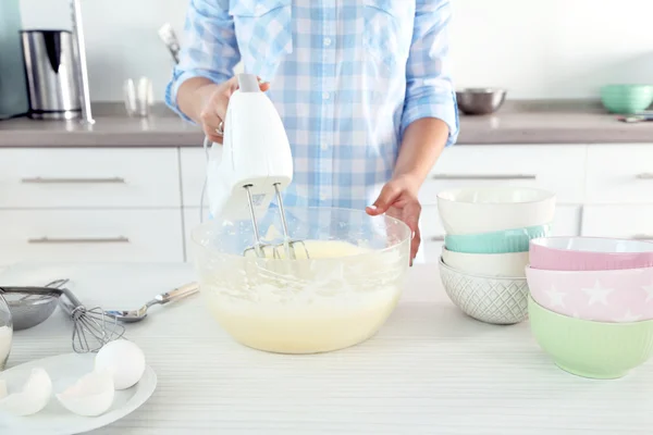 Young woman making cake - Stock Image - Everypixel