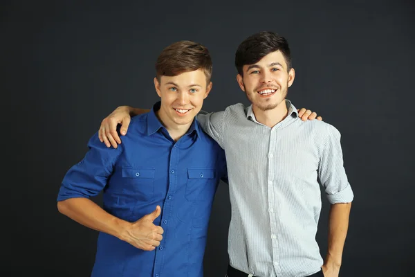 Cool family picture poses | Two handsome brothers posing to the family ...