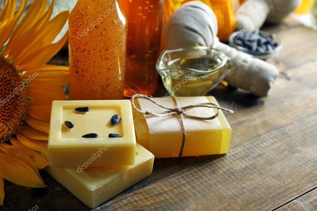 Soap bar and Spa treatments and sunflower on wooden background Stock ...