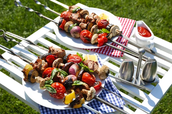 Barbecue on plate outdoors - Stock Image - Everypixel