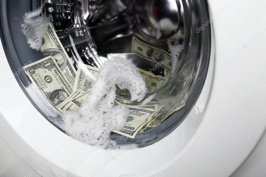 Money in washing machine — Stock Photo © belchonock #87168902