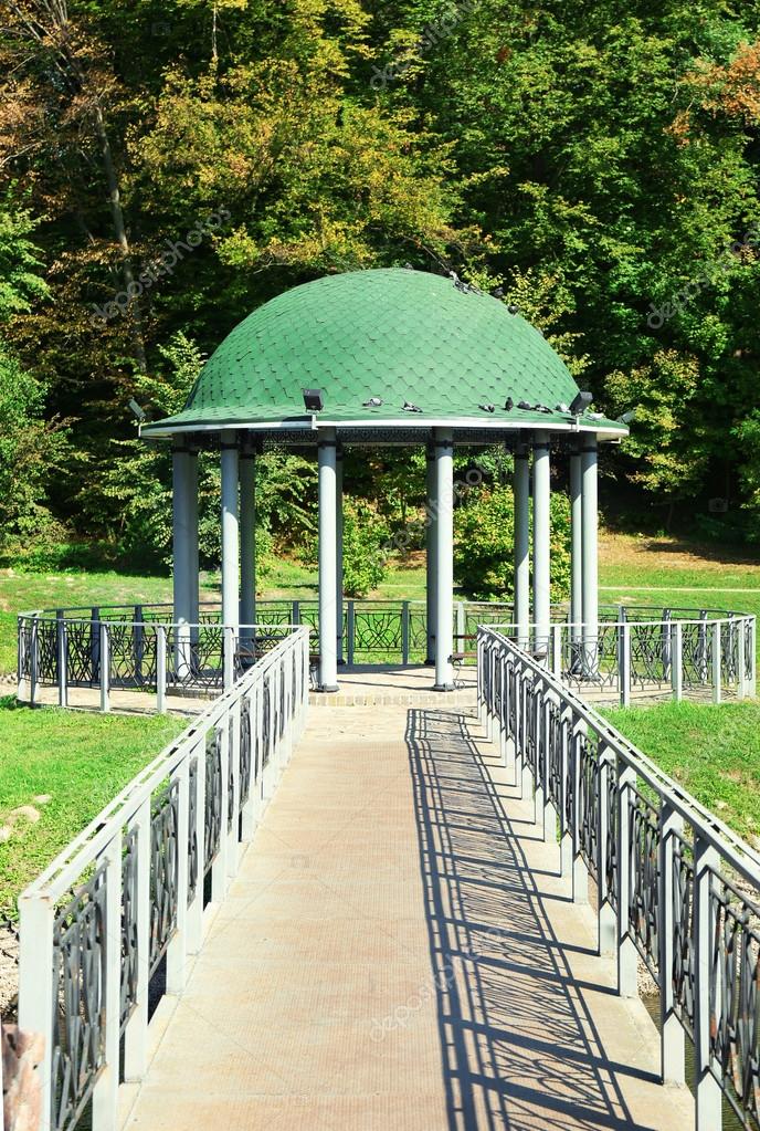 Park with rotunda and paths in Feofania — Stock Photo © belchonock ...