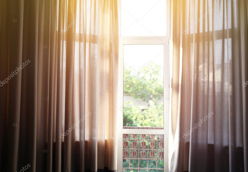 Window with beautiful curtains Stock Photo by ©belchonock 87849290