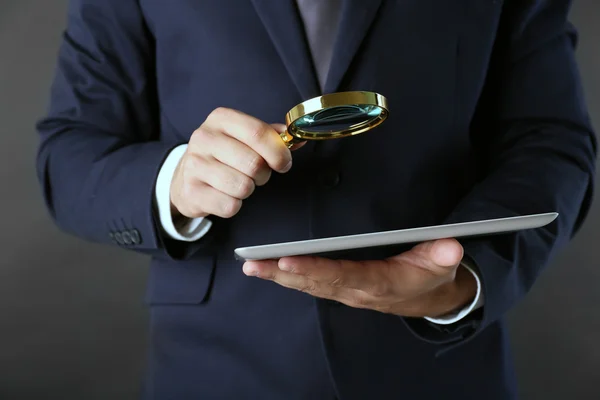 Businessman Examining Documents With Magnifying Glass — Stock Photo ...