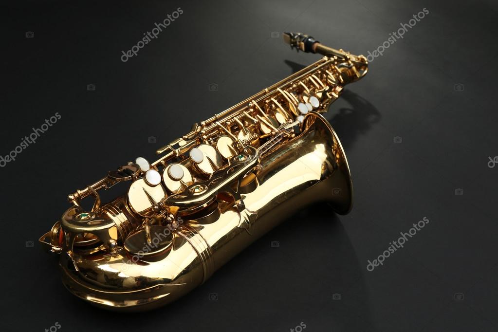 Beautiful golden saxophone Stock Photo by ©belchonock 91285586