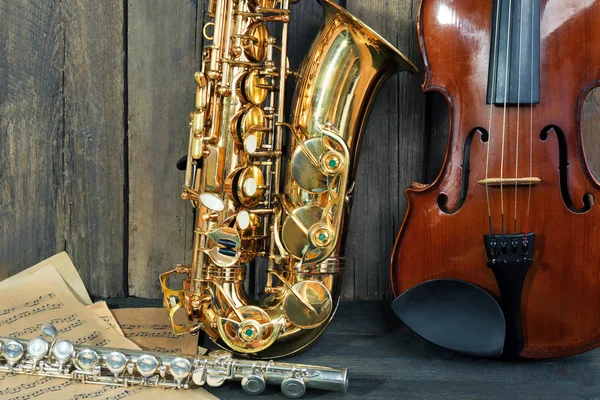 Musical instruments: saxophone, violin and flute - Stock Image - Everypixel