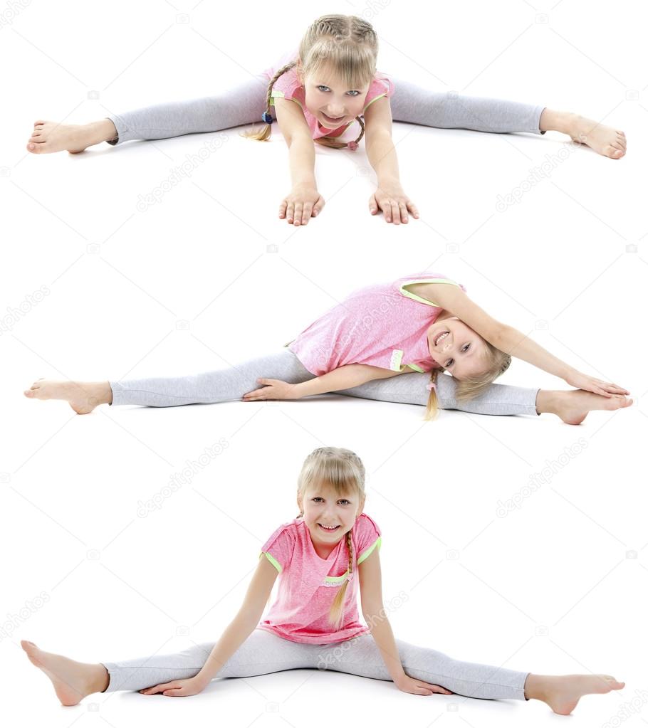 Little girl doing exercises Stock Photo by ©belchonock 93002258