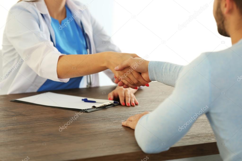 Patient visiting doctor ⬇ Stock Photo, Image by © belchonock #93787360
