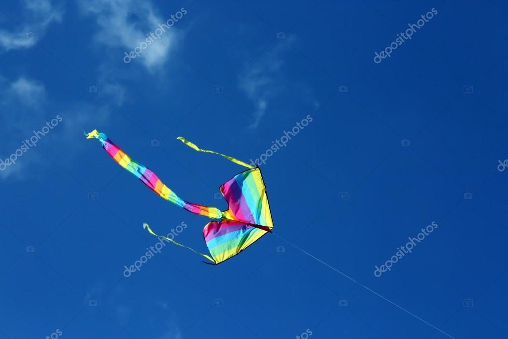 Kite in dark blue sky — Stock Photo © belchonock #95303950
