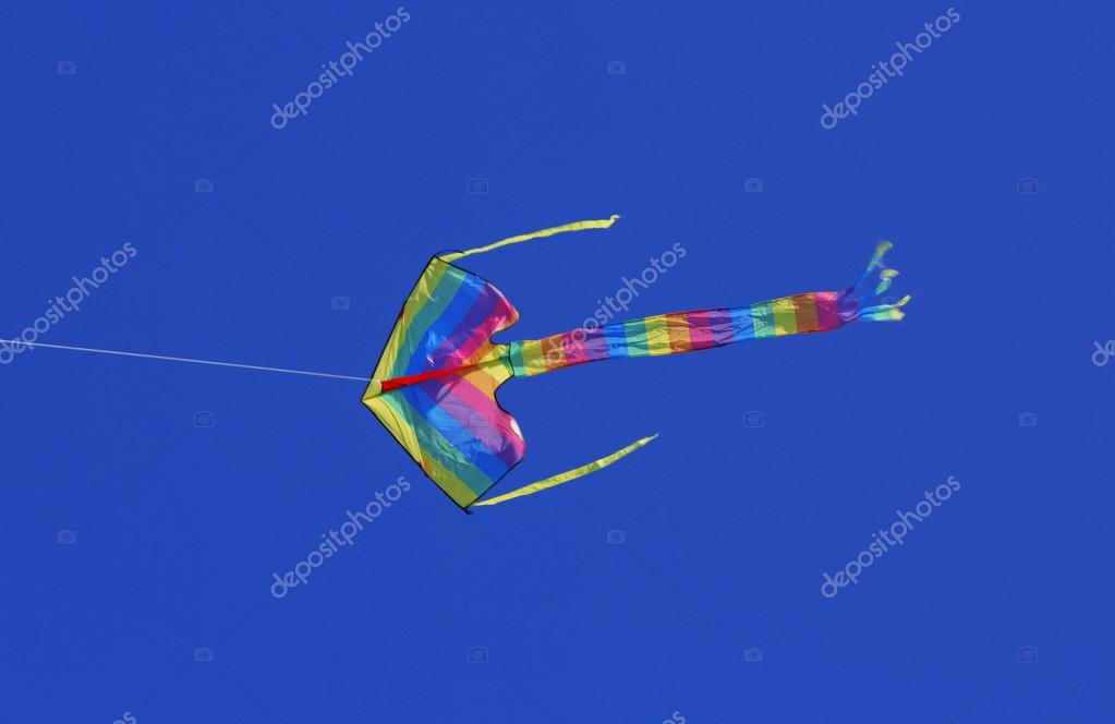 Kite in dark blue sky Stock Photo by ©belchonock 95304208