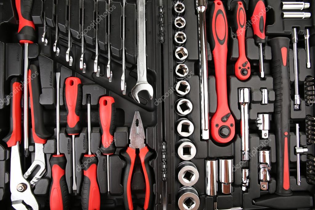 Set of tools in box closeup Stock Photo by ©belchonock 95799448