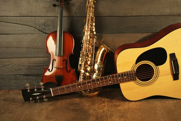 Musical instruments on wooden — Stock Photo © belchonock #91285616