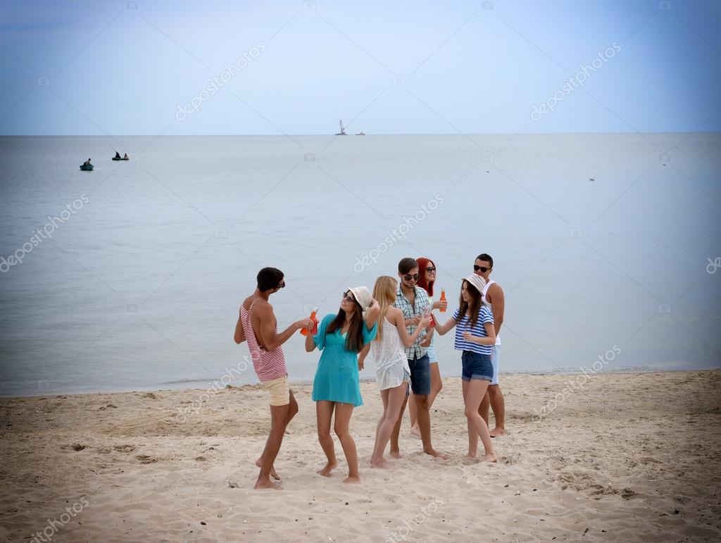 Beautiful young people having fun Stock Photo by ©belchonock 97759212