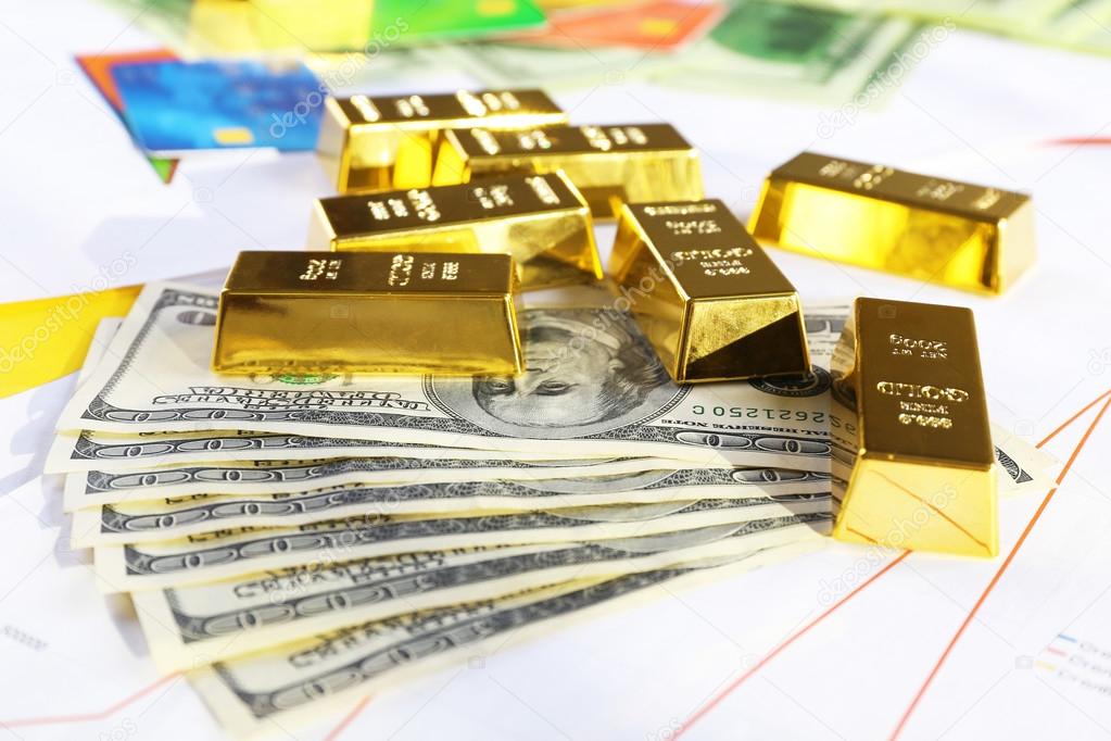 Gold bars with dollar banknotes Stock Photo by ©belchonock 98678046