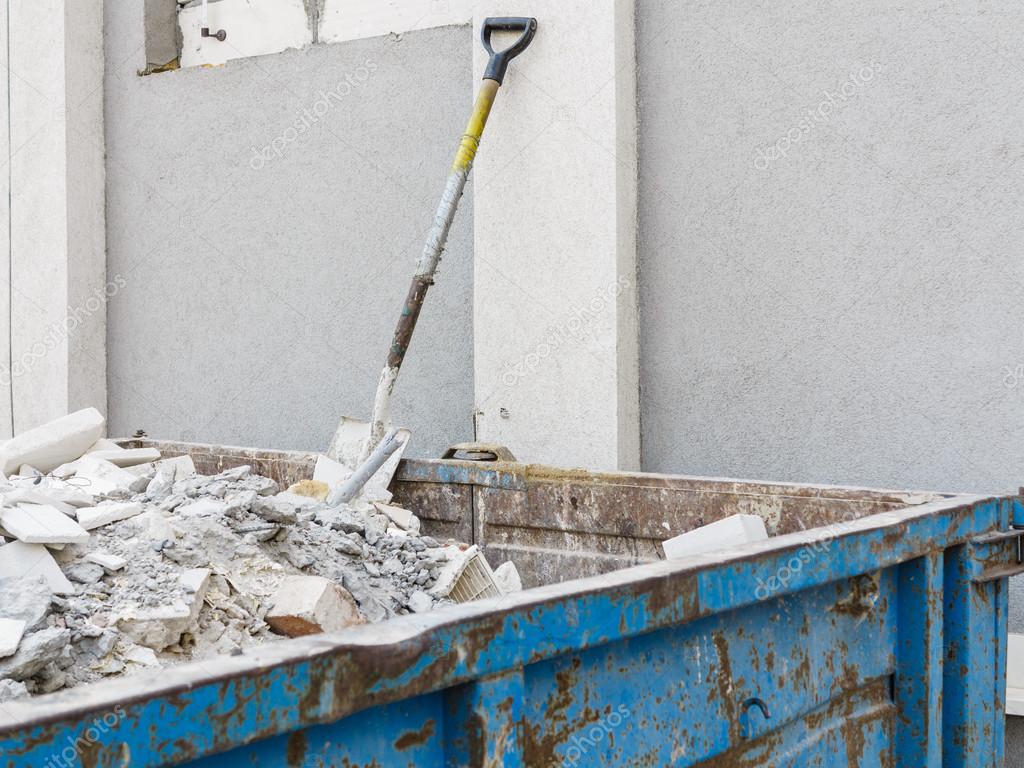Full construction waste debris container Stock Photo by ©Anetlanda 75363271