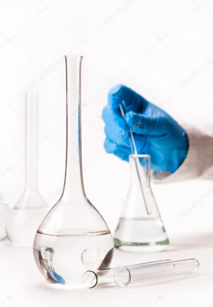 Mix reagents into the flask Stock Photo by ©JamaL1977a 69527571