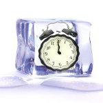 Alarm clock in ice Stock Photo by ©ekostsov 34915933
