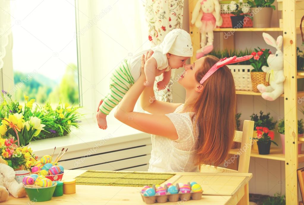 Happy family celebrating easter mother and baby with bunny ears Stock ...