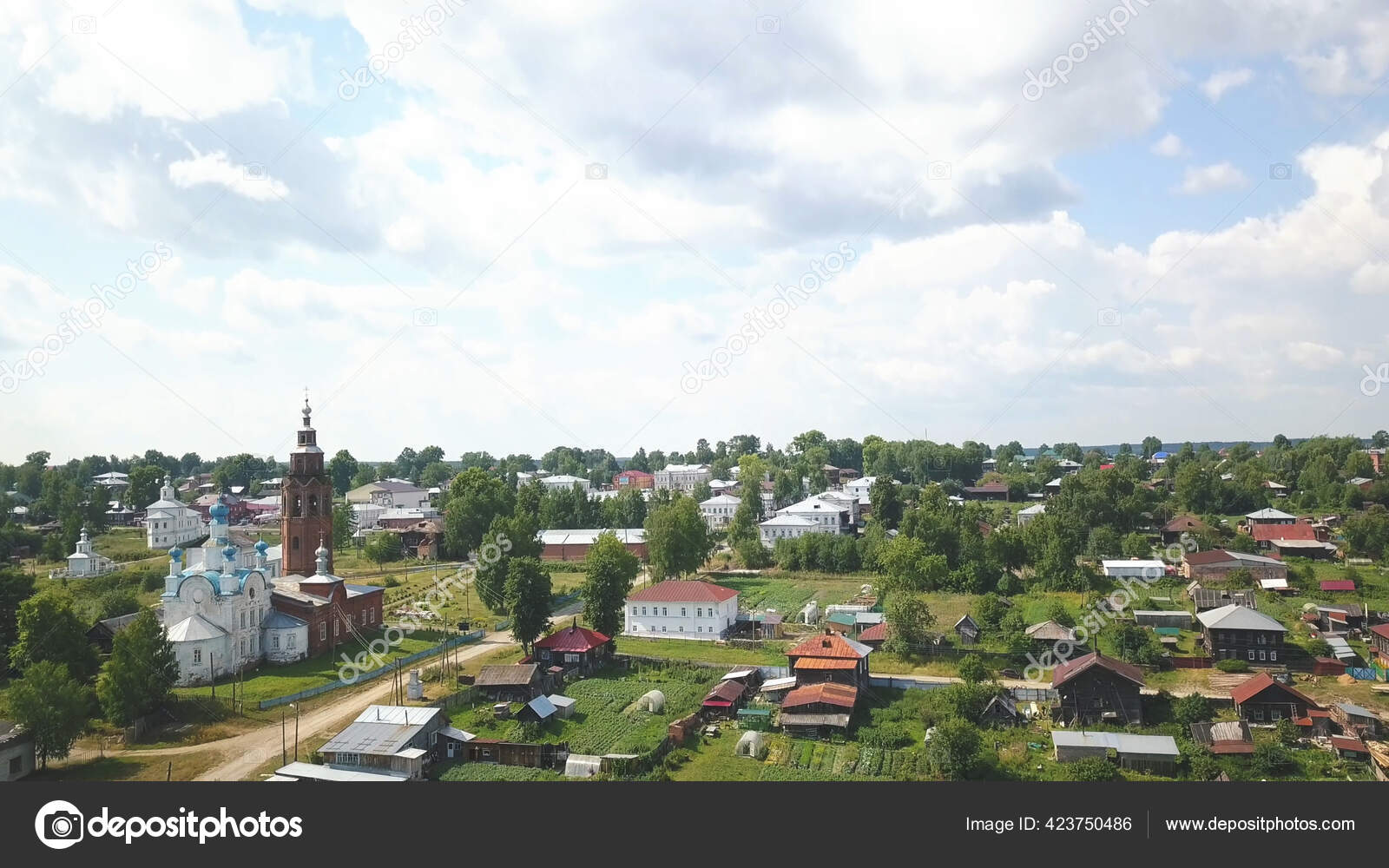 Small town in a summertime, birds eye aerial view. Clip. Beautiful ...