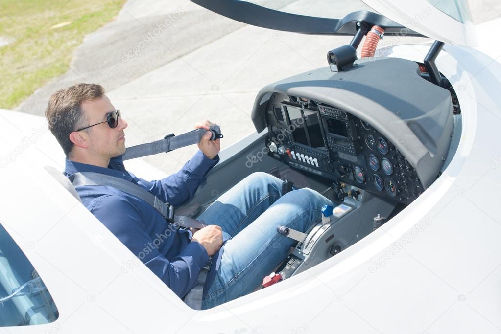 Pilot in cockpit and pilot Stock Photo by ©photography33 104869040