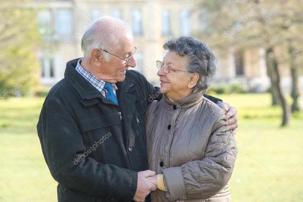 Elderly couple holding hands Stock Photo by ©photography33 106114320