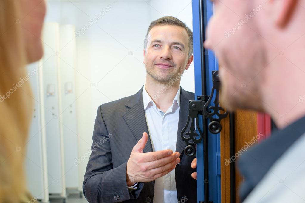 Man helping clients Stock Photo by ©photography33 107923810