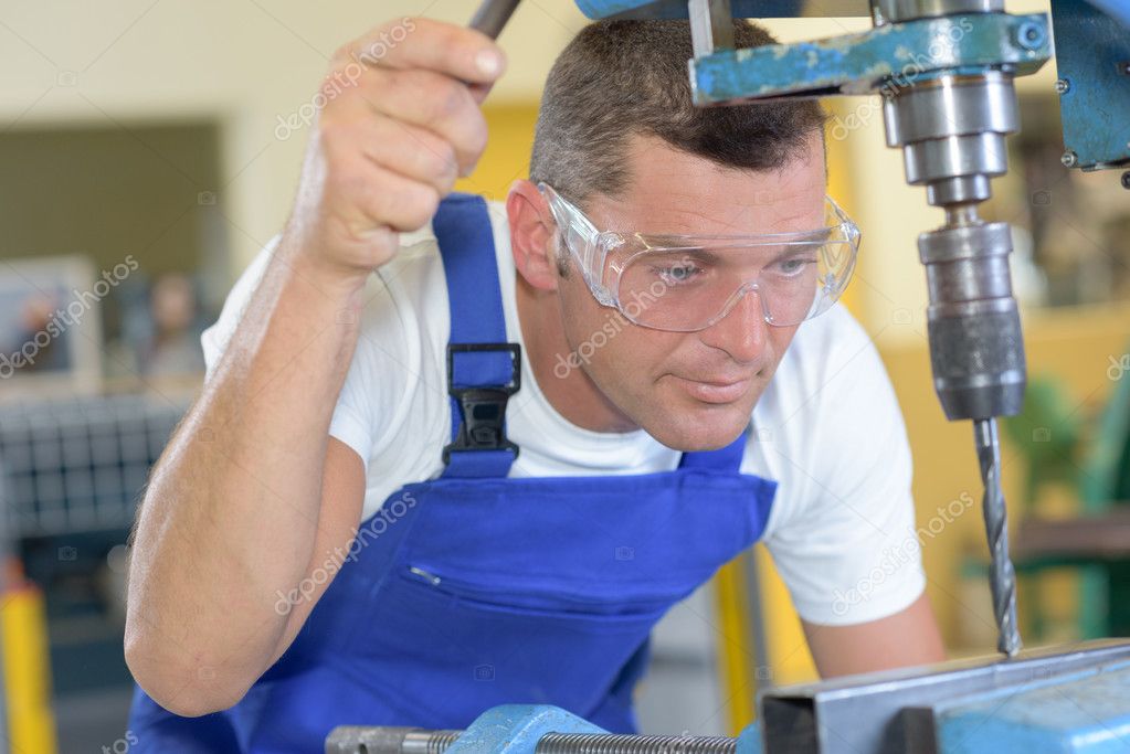 Man drilling and man — Stock Photo © photography33 #115260138