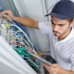Portrait of an electrician at work Stock Photo by ©minervastock 30136813