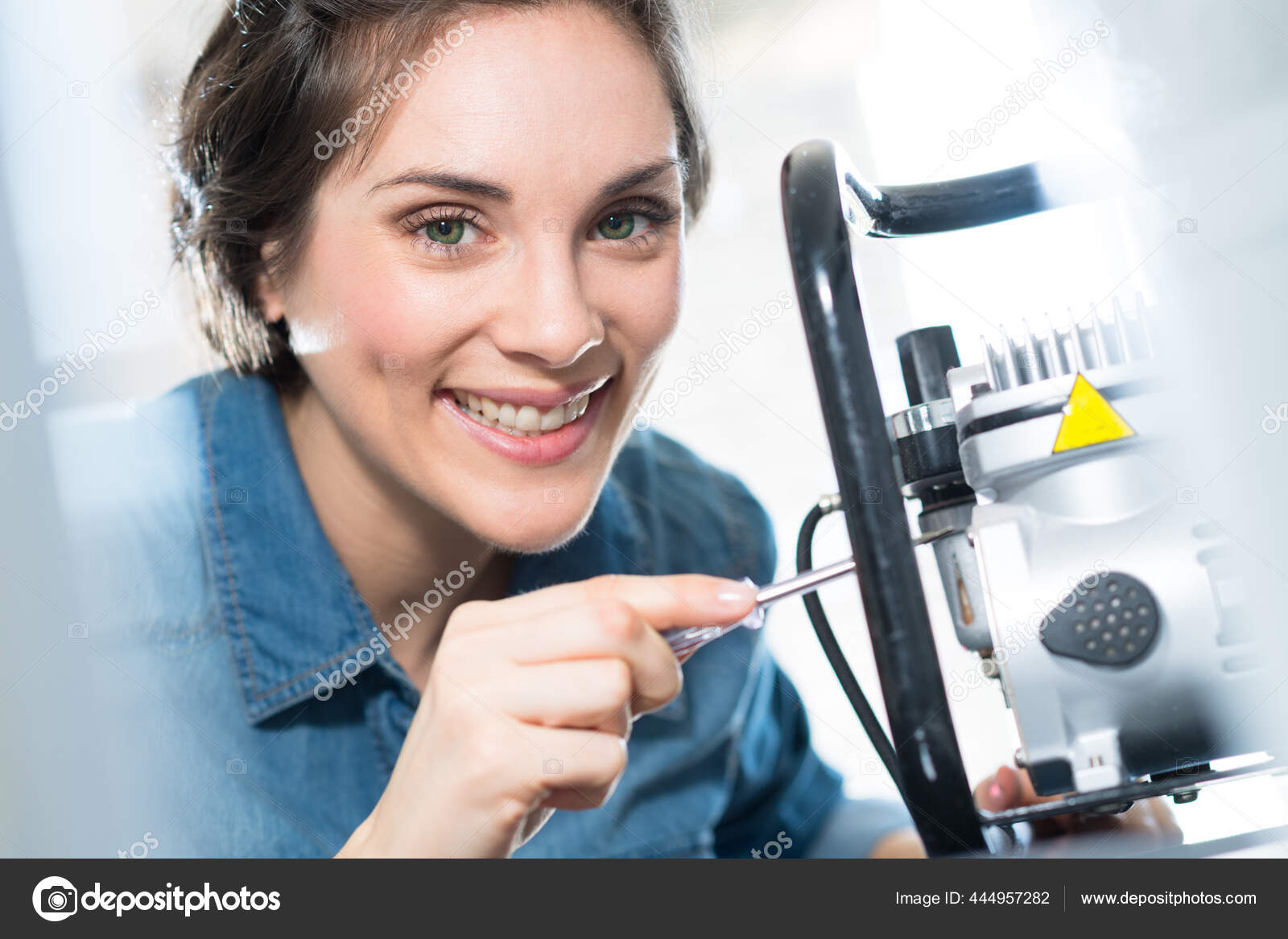 Woman Fixing Machine Stock Photo by ©photography33 444957282