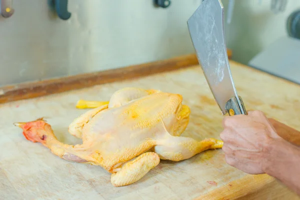 Chopping a chicken and blade — Stock Photo © photography33 #115259392