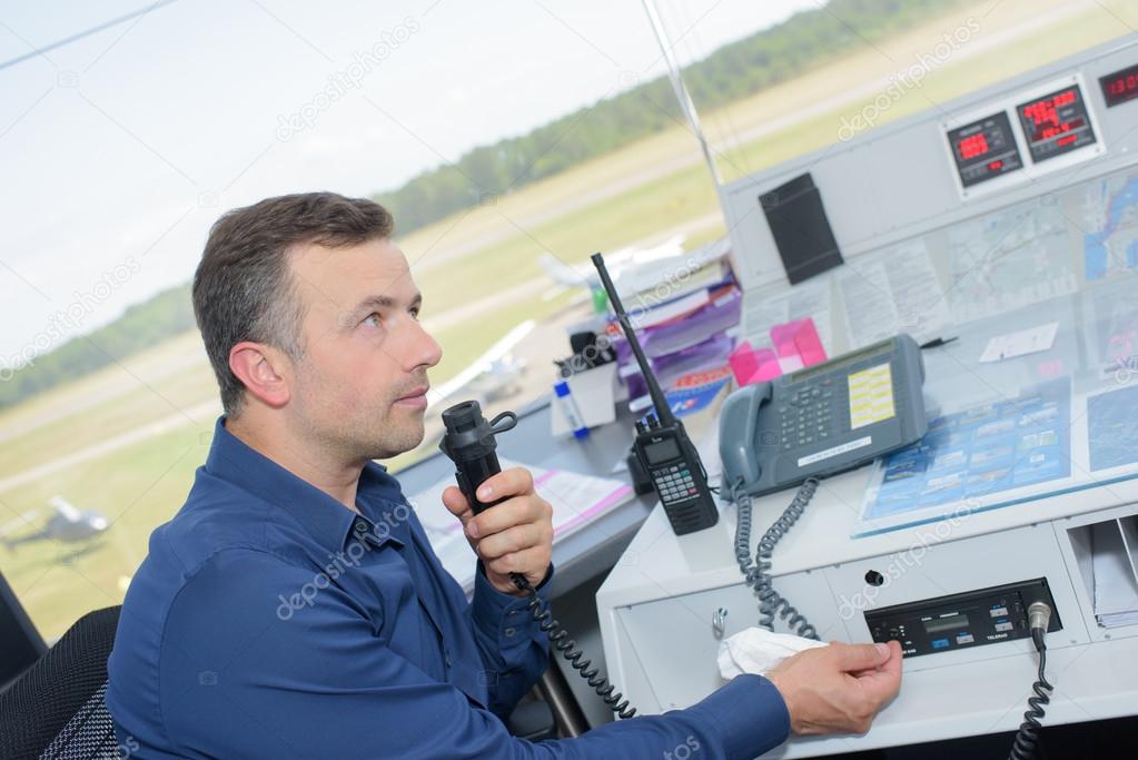 Man at work in control tower — Stock Photo © photography33 #92352846