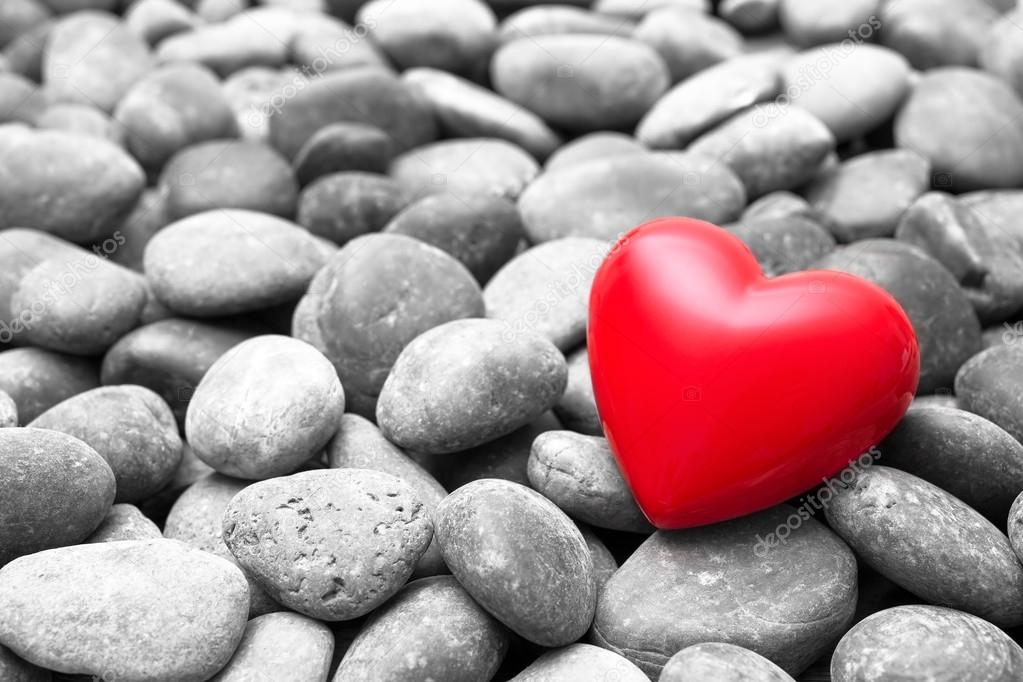 Red heart on pebble stones — Stock Photo © alexraths #61877937