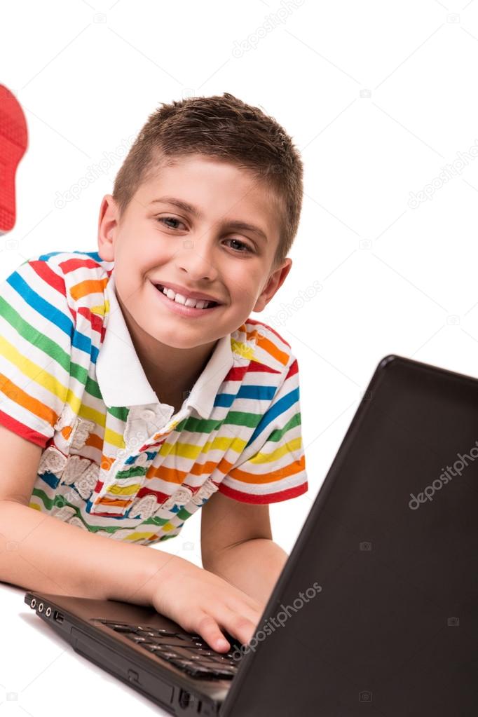 Kid using a computer — Stock Photo © jolopes #54010079