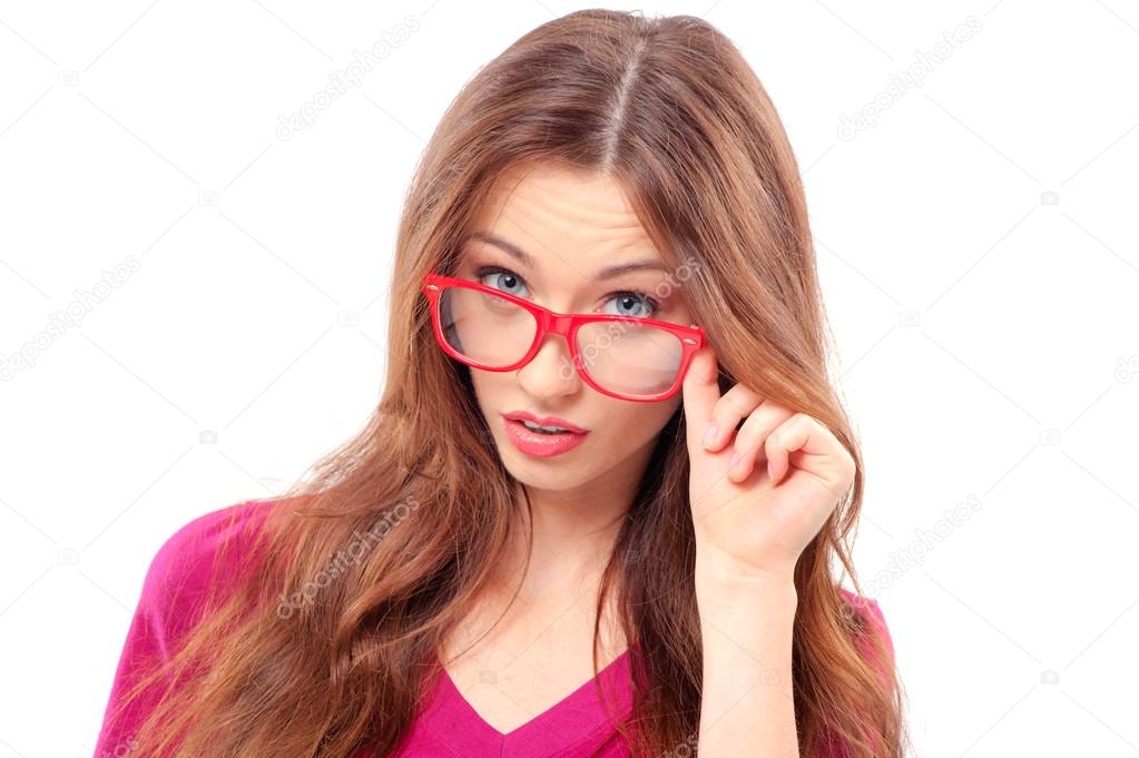 Model looking over her glasses Stock Photo by ©luengo_ua 96970518